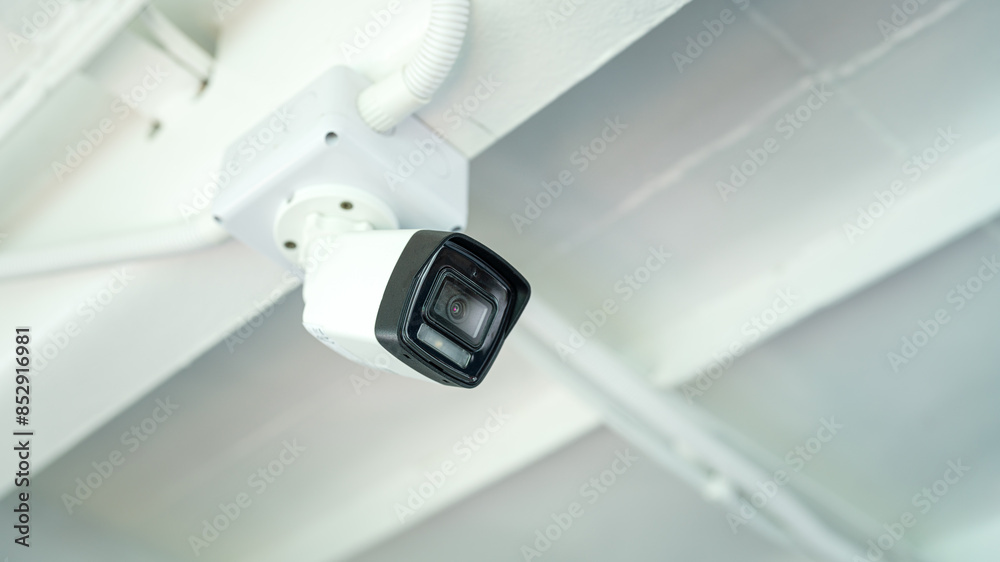 A CCTV survey camera is installed on metal structure, ceiling of ...