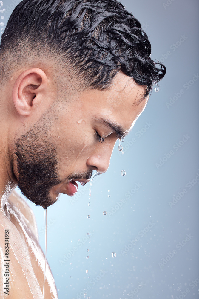 Man, shower and water drops on face for skincare with washing body, hygiene wellness and skin ...