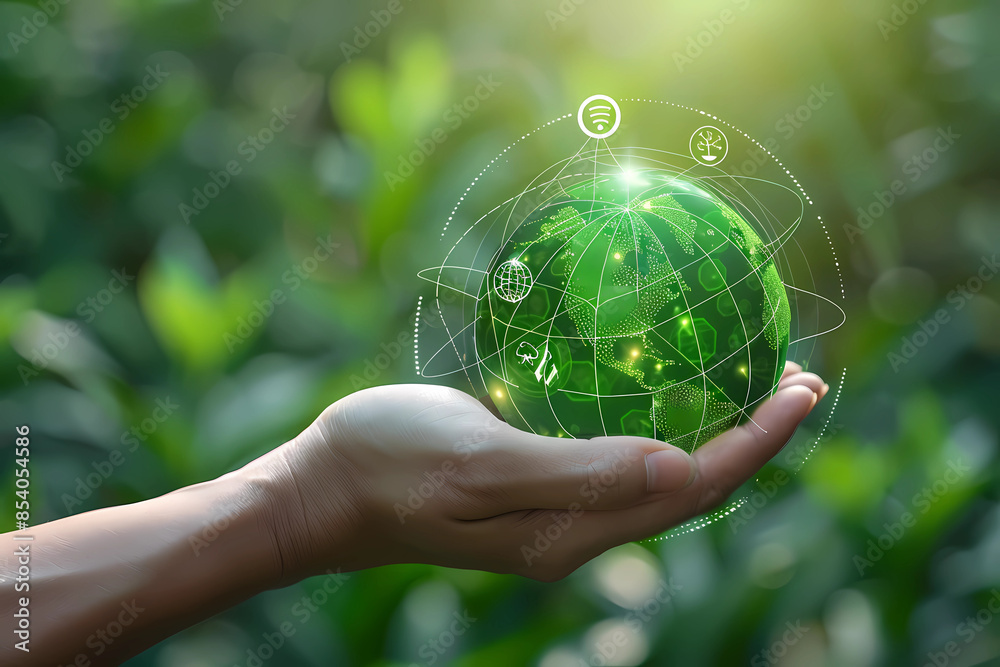 Sustainable Development concept: hands holding a green globe ...