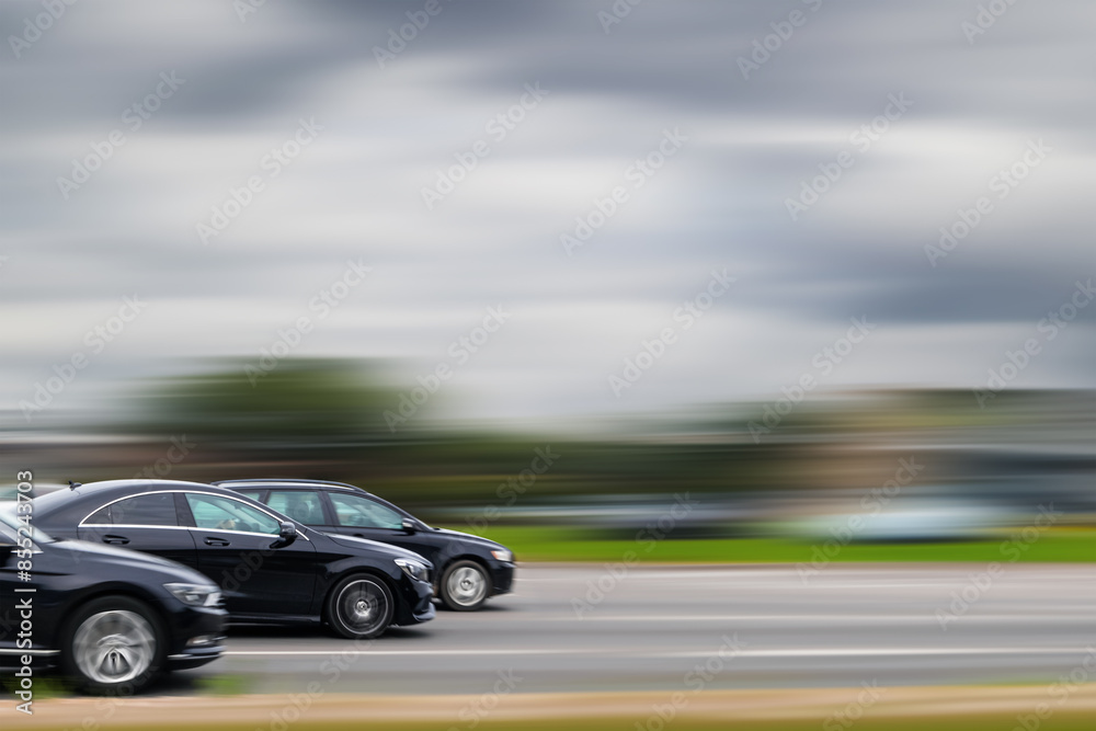 Fast moving cars on highway with motion blur background. Concept of ...