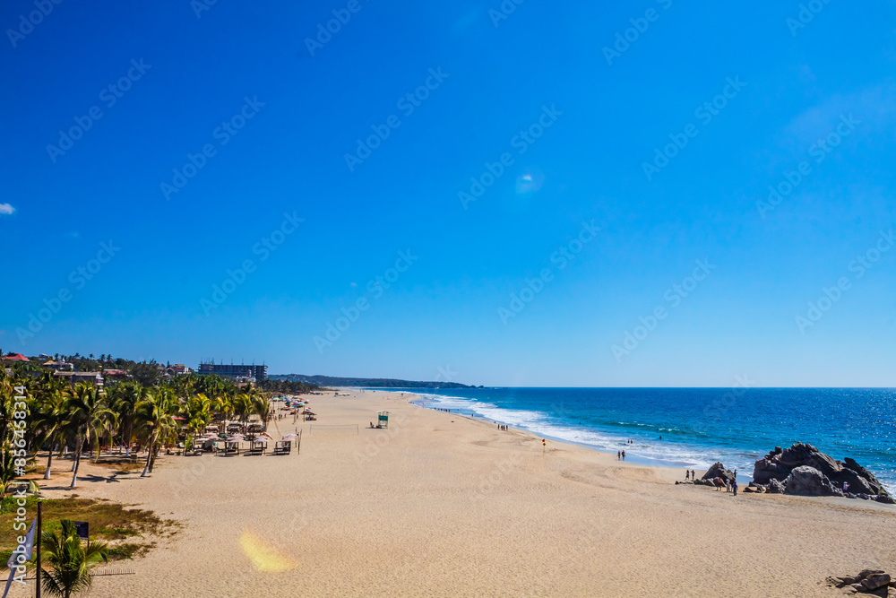 Puerto Escondido Oaxaca beach with nopales in the foreground and a ...