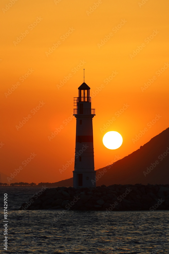 Seascape at sunshine. Lighthouse and sailings on the coast. Seaside ...