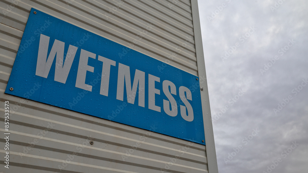 Wet wetmess (wet mess) room sign on exterior of modular, transportable ...