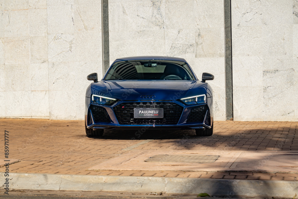 Photo Stock Blue Audi R8 Front view in front of white wall, Luxury ...