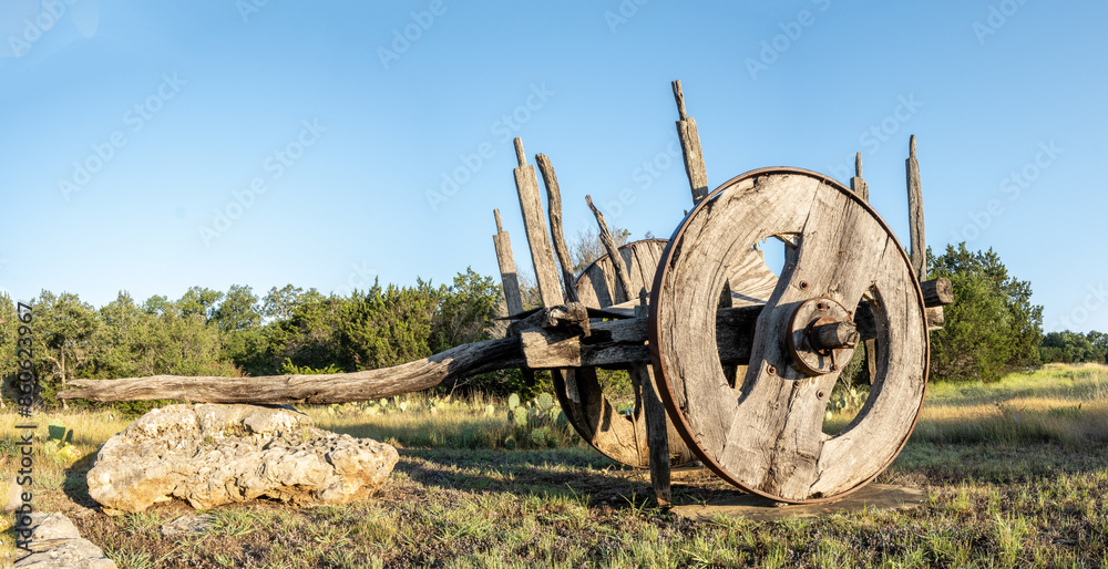 Ancient ox cart with semi solid wooden wheels and remnant of railing ...
