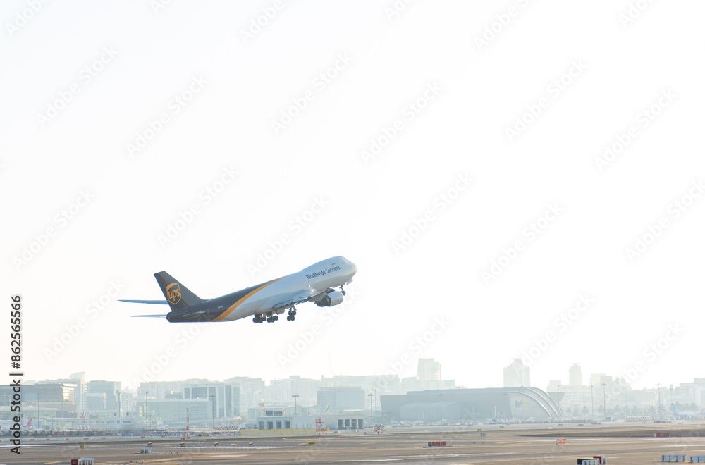 UPS airplane taking off from Dubai International Airport Terminal 2 ...