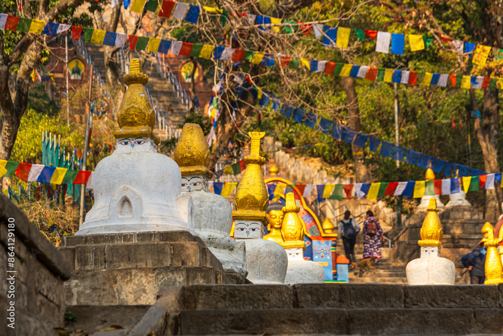 Small white stupas with face and golden top, Bhagwan Pau Swayambhu ...