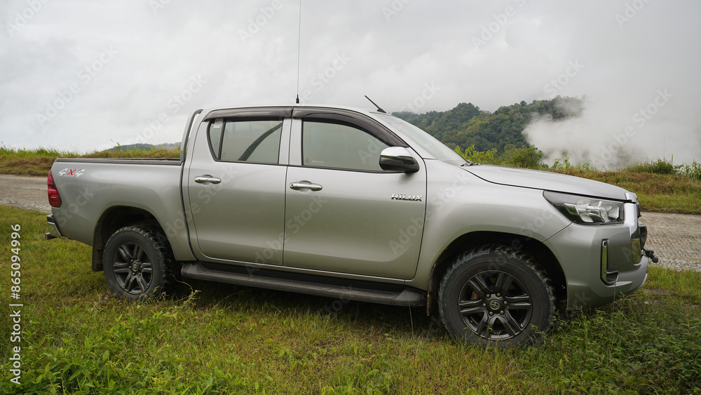 four wheels drive double cabin Toyota Hilux car, outdoor hills and ...