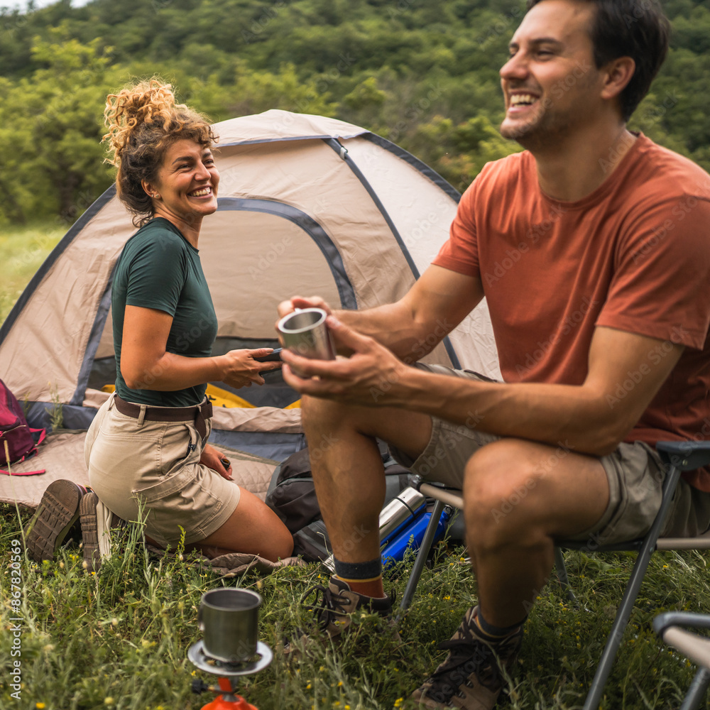 Boyfriend and girlfriend have fun and camp time together, happiness ...