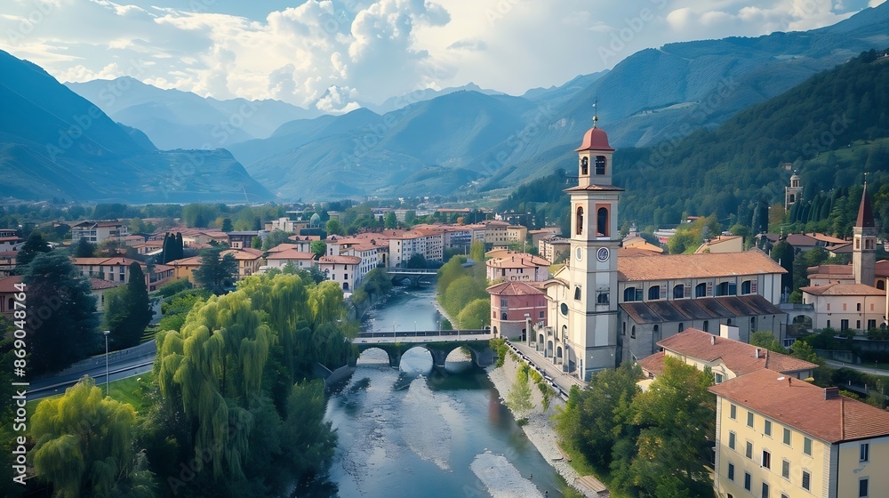 Aerial view of old church and crossing rivers surrounded by Alps ...