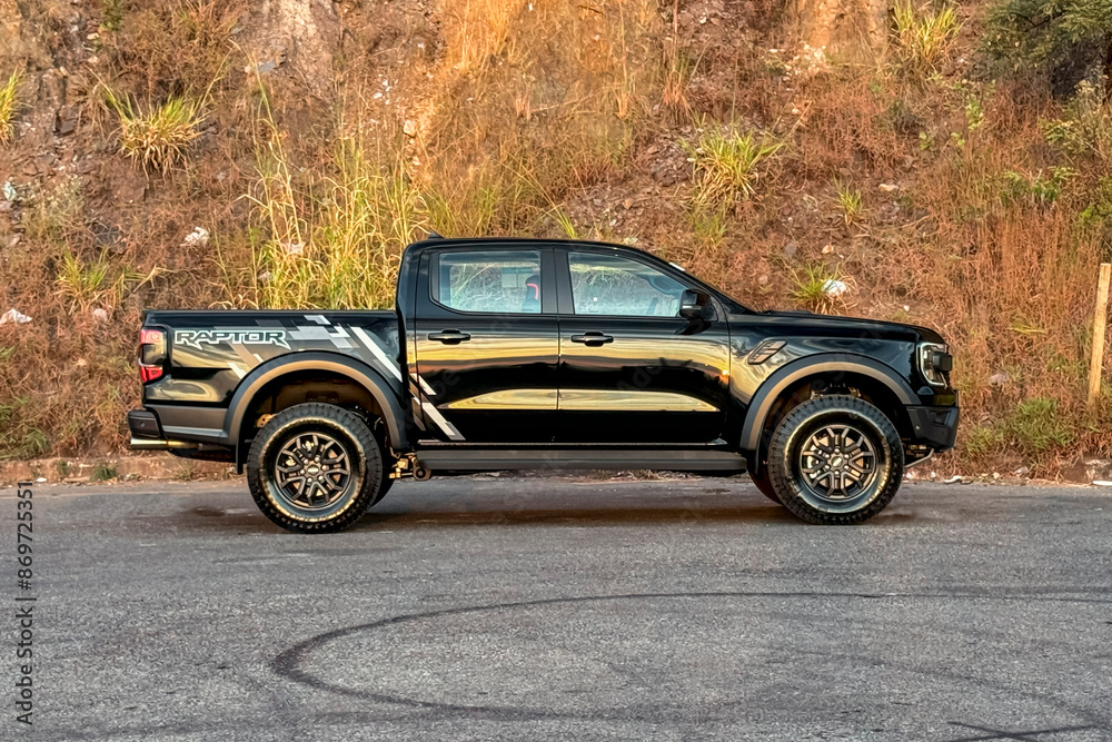 Black Ford F-150 Raptor side view in off-road cenario, Luxury Pick-up ...