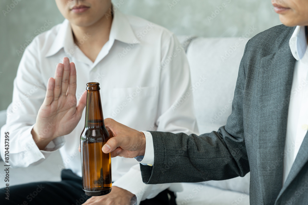 refuses say no and avoid to drink an alcohol , hand show reject and ...