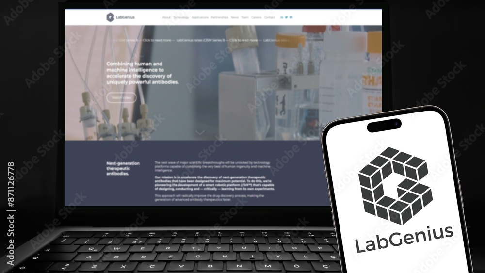 Lab Genius logo on a smartphone screen with website in background. Lab ...