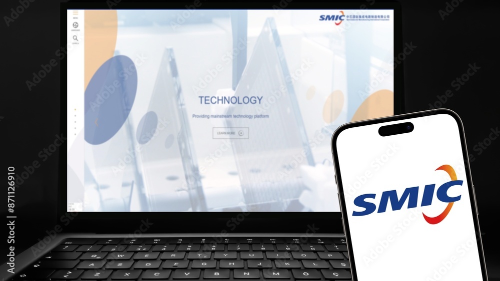 SMIC logo on a smartphone screen with website in background. SMIC ...