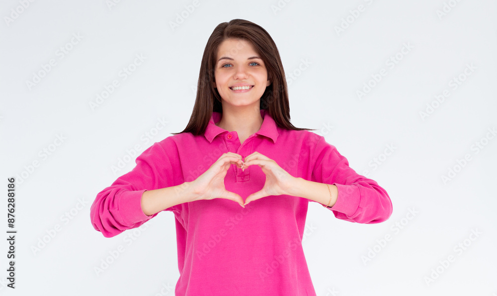 Positive healthy happy young woman show heart sign smiling, cherish ...