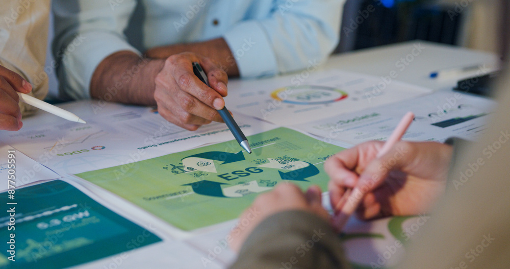Closeup group Asia businesspeople talk ESG strategies risk management workshop night, SDGs ...
