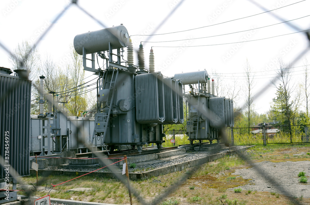 Transformers, insulators high-voltage lines of an electric substation ...
