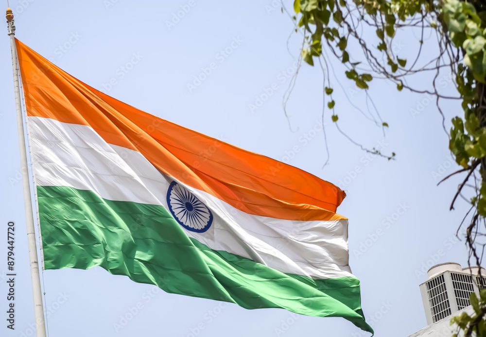 India flag flying high at Connaught Place with pride in blue sky, India ...