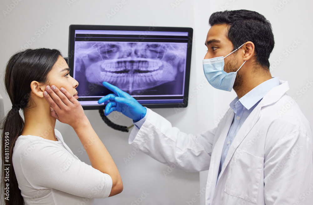 Dentist, communication and x ray of teeth on screen for patient ...