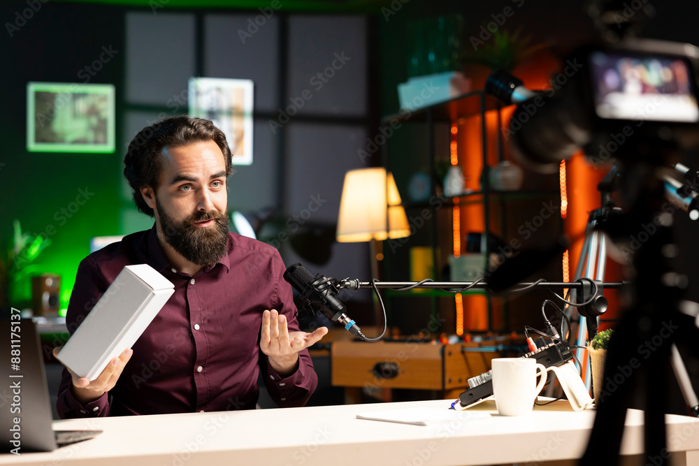 Tech influencer using professional camera and mic to film technology ...