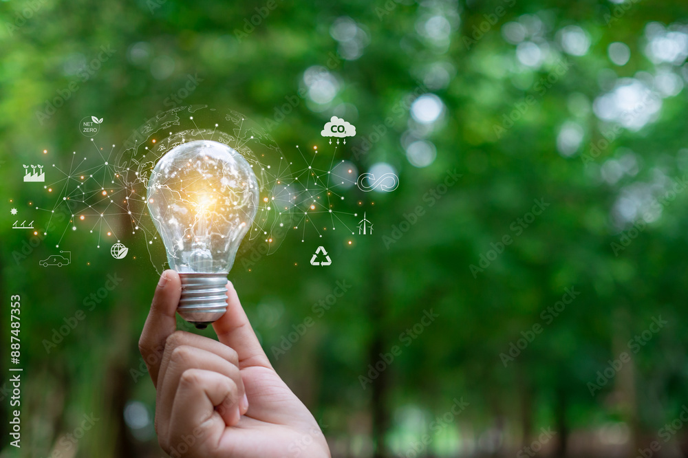 Hand human holding electricity light lamp, Carbon neutral and net zero ...