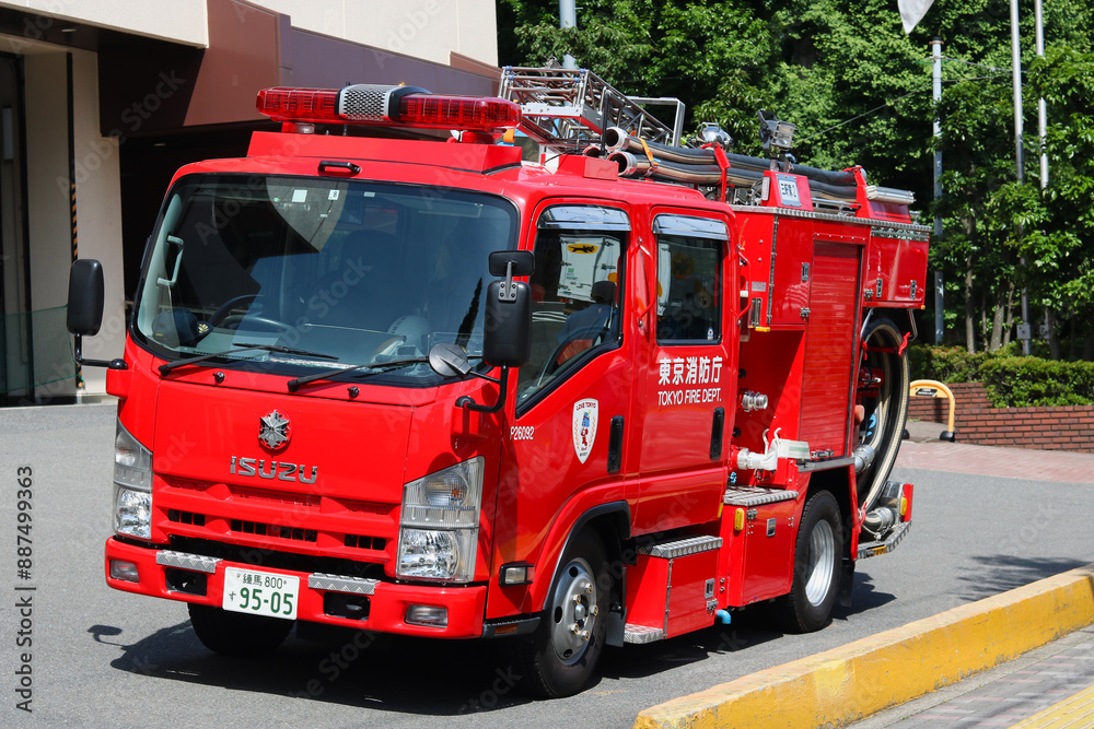 TOKYO, JAPAN - June 8, 2024: A fire engine outside a fire station in ...
