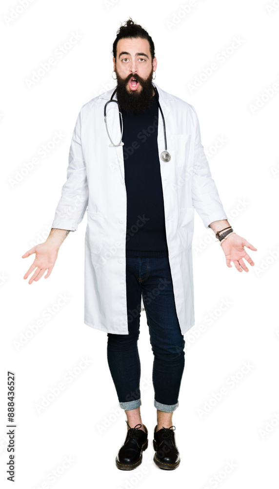 Doctor with long hair wearing medical coat and stethoscope In shock ...