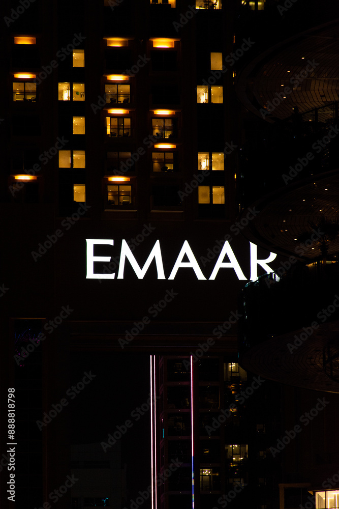 Emaar Real Estate company sign in neon light at night. Dubai, UAE ...