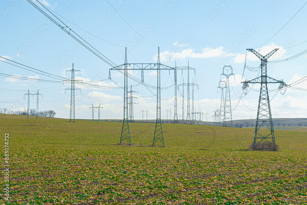 High voltage distribution poles with cables in the countryside Stock ...