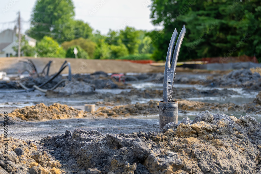 Casing pipe with polyethylene ground loop pipes in the process of being ...