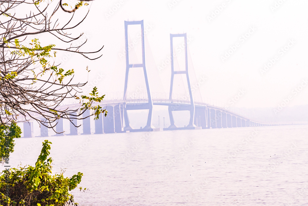 The Suramadu Bridge, the longest bridge in Indonesia, stretches across ...