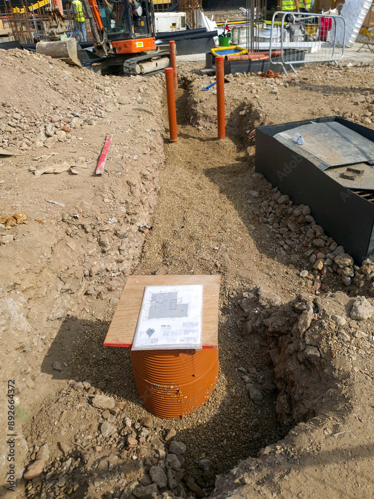 Foto de Stock Construction site with PVC underground drainage manhole ...