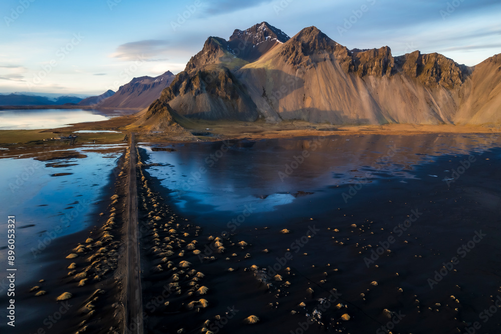 Aerial view of rugged Stokksnes Peninsula with majestic Vestrahorn ...