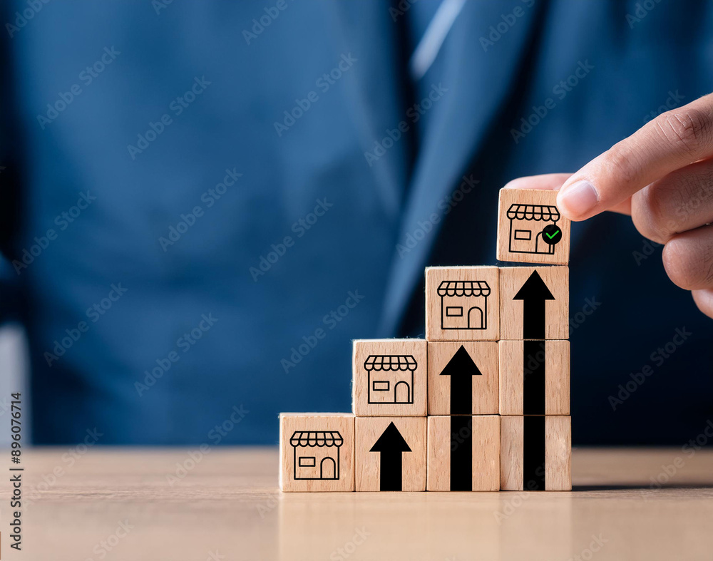 Concept of Business Growth and Franchise Expansion: Stacking Wooden ...
