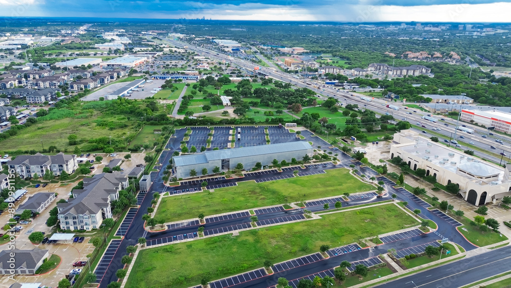 Large vacant outdoor parking lot along Interstate Highway 35 in ...