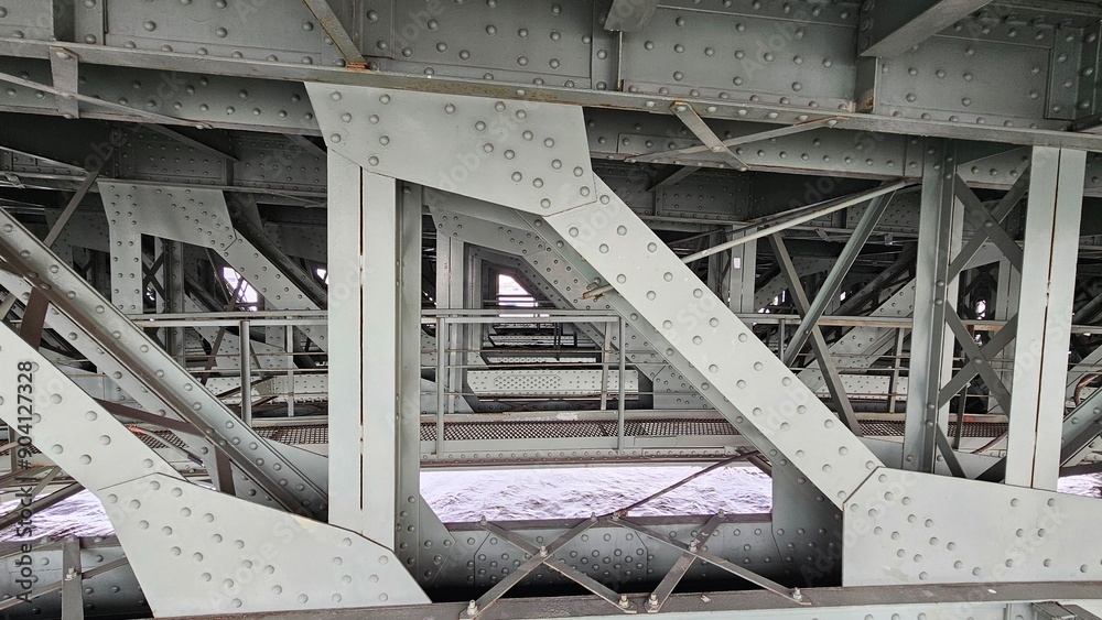 Ancient iron bridge structure, interior view, metal floor beams with ...