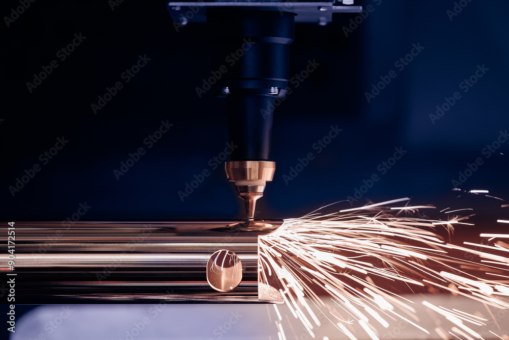 Closeup CNC Laser cut of metal, background industry factory. Aerospace ...