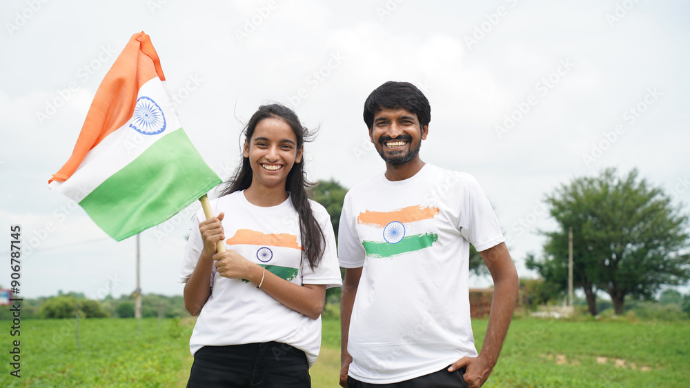Young and Little Indian holding or waving Indian Tricolor Flag ...