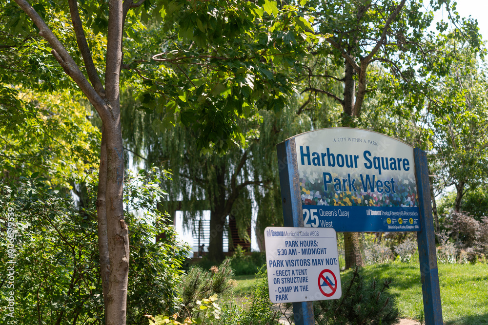 City of Toronto sign at Harbour Square Park West and other signs with ...
