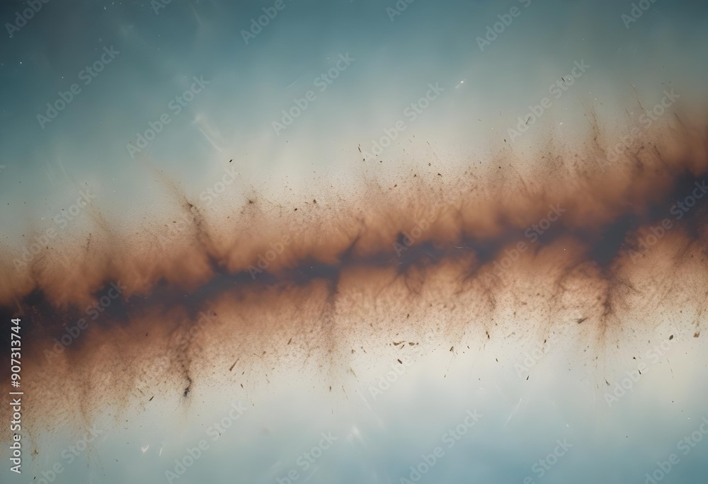 Intense dark grainy texture against a blue background, featuring a ...