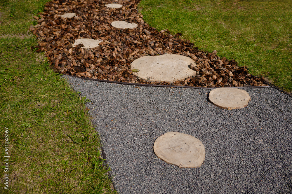 Tactile eco-trail in city park with different textures for walking ...