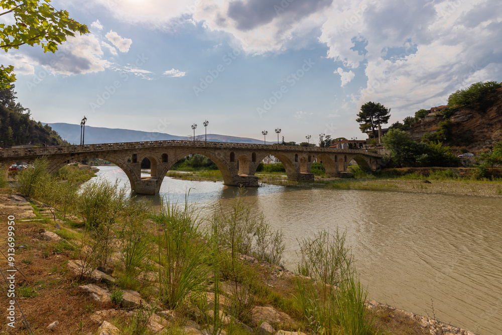 Gorica Bridge over the Osum river is a landmark in the city of Berat ...