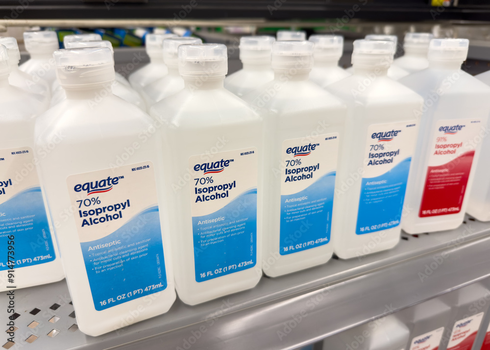 Containers of isopropyl alcohol by Equate, a Walmart store in-house ...