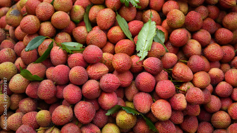Freshly picked ripe lychees, ready for sale at the market. Vibrant ...