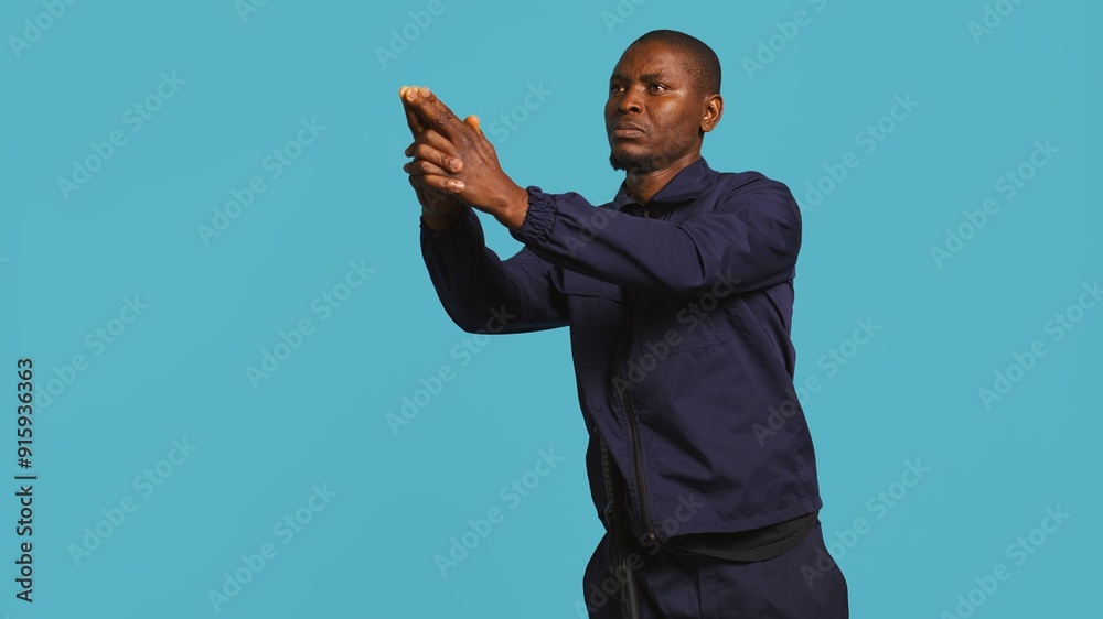 Portrait of security guard overseeing premises to prevent intrusion ...