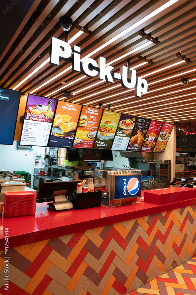 KUALA LUMPUR, MALAYSIA - NOVEMBER 14, 2023: service counter in Jollibee ...
