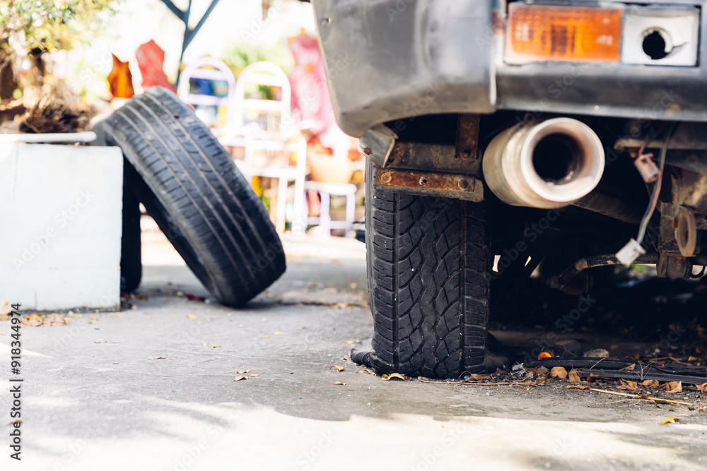 Destroyed blown out tire with exploded, shredded and damaged tire on a ...