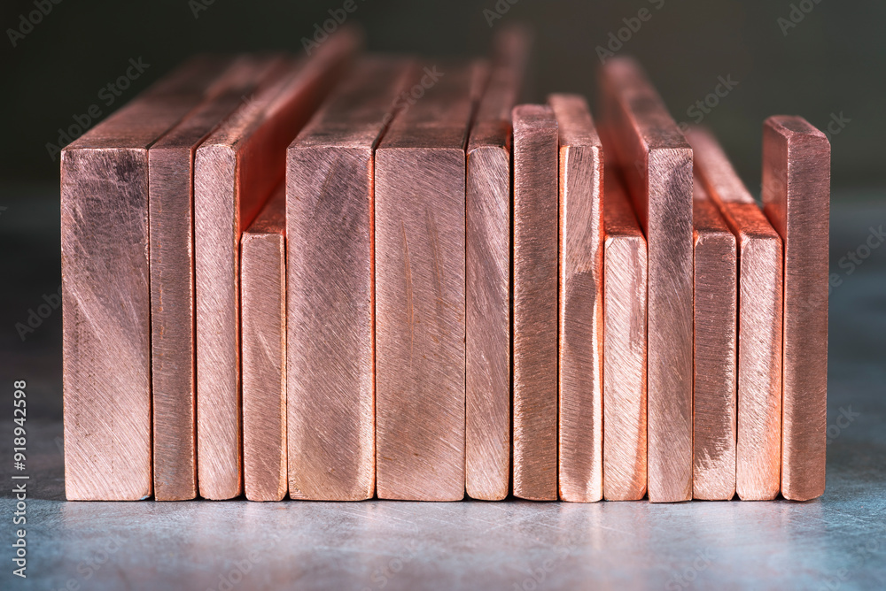 Row of copper flat bars, product of the non-ferrous metals industry ...