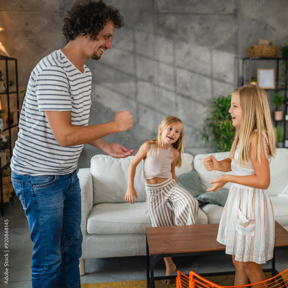 Adult single father play rock paper scissors hand game with daughter ...