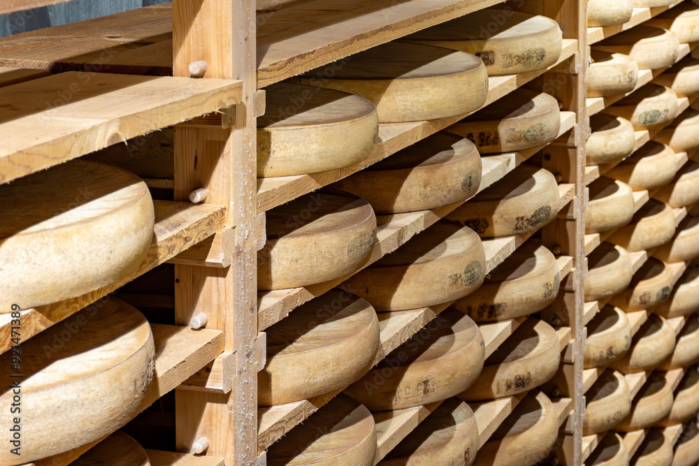 Aging rooms with shelves in cheese caves, central location for aging of ...